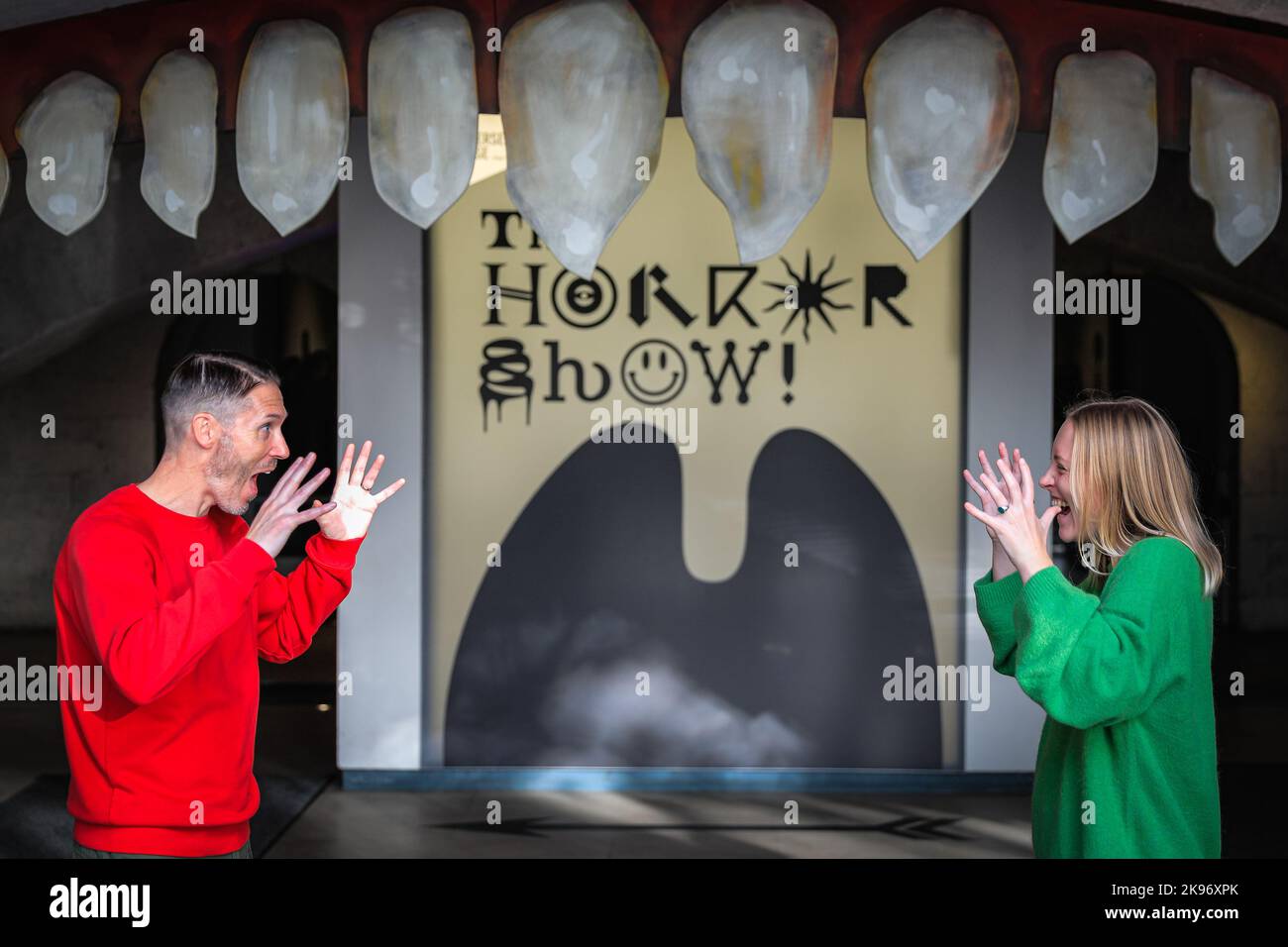 London, UK. 26th Oct, 2022. Staff pose at the entrance to the ...