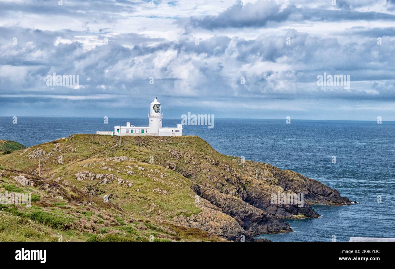 An aerial view of the historic South Stack Lighthouse on the shore of ...