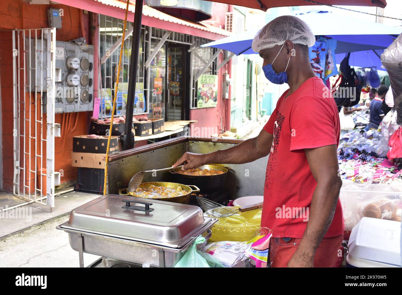 Barbados fish cale man hi-res stock photography and images - Alamy