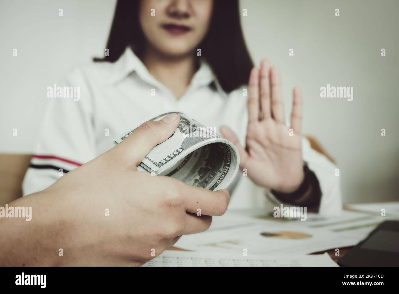 focus hand holding money, The auditor shows a gesture of refusing to ...