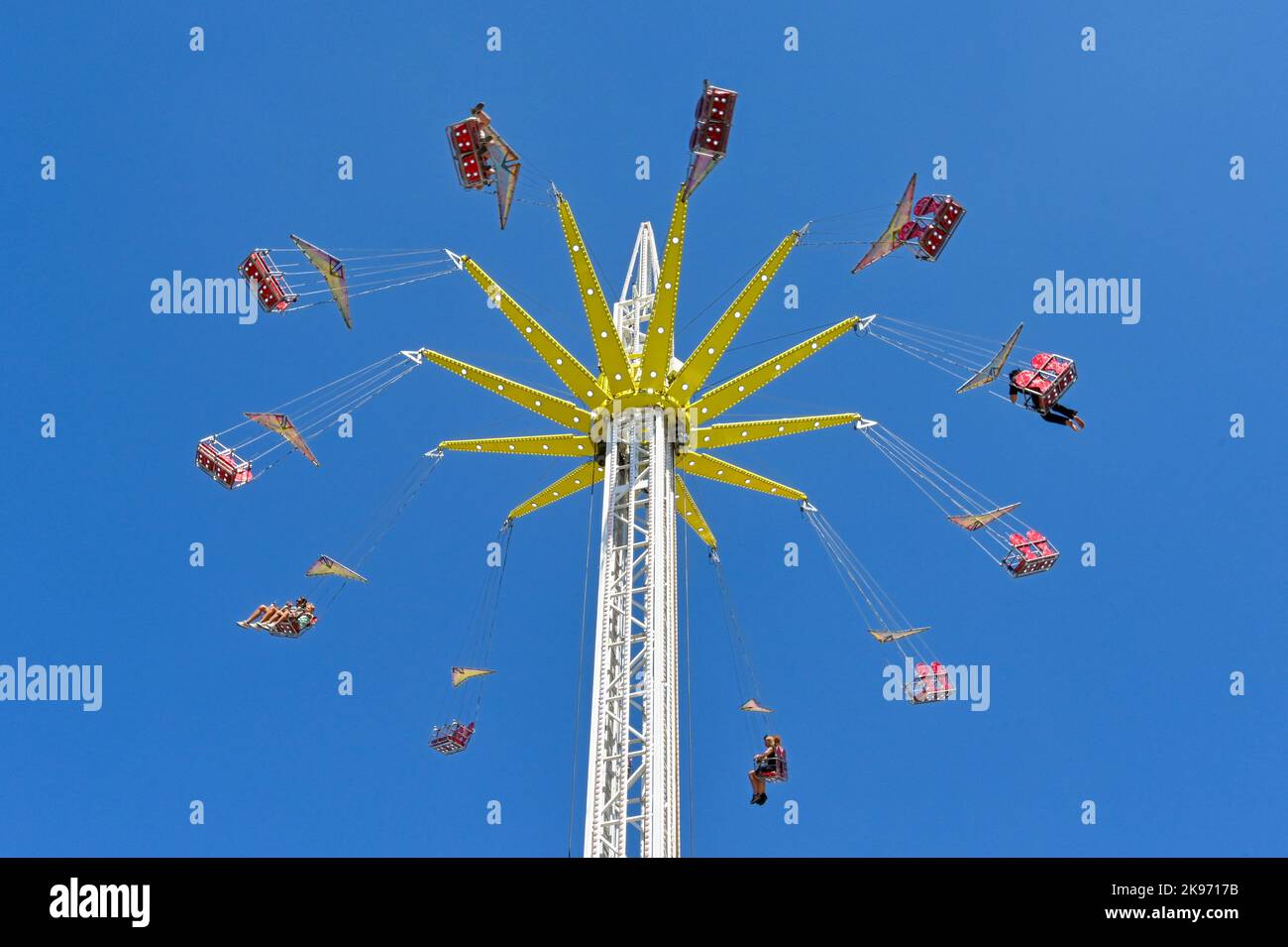 Middleburg, Netherlands - August 2022: People enjoying a ride on a tall ...