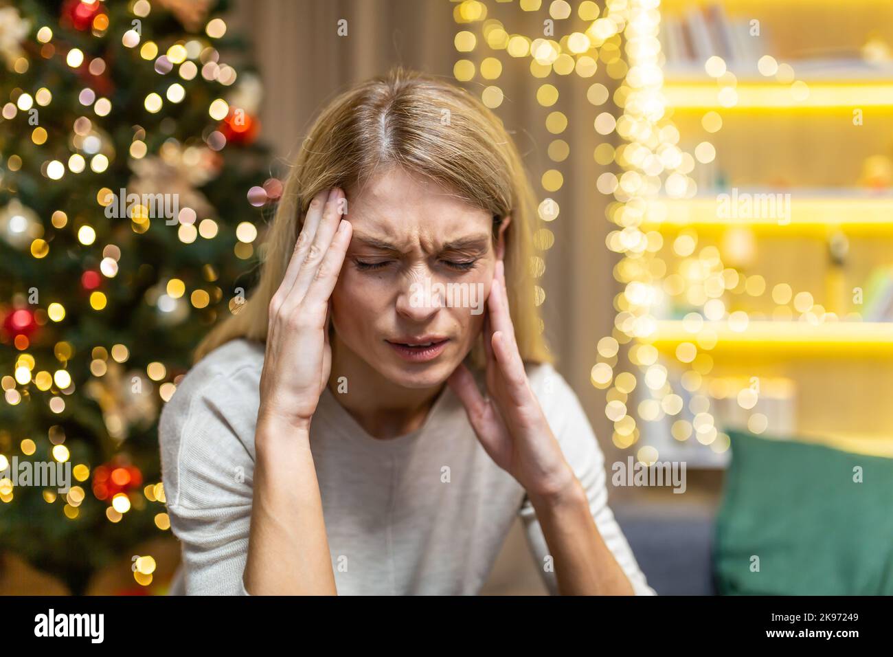 sad Woman alone at home for Christmas and New Year, sitting depressed ...