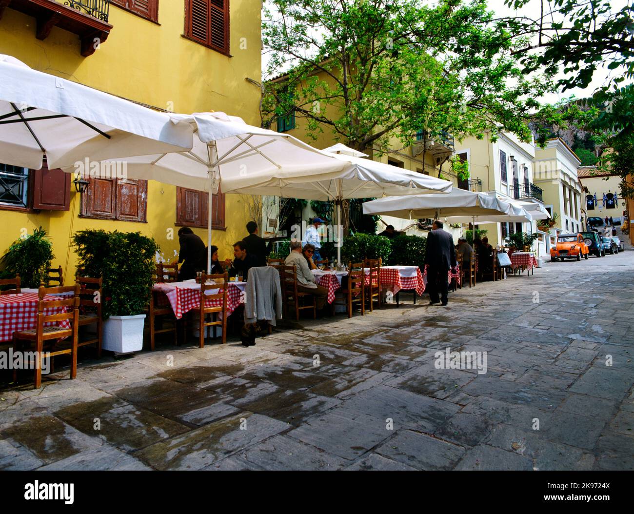 Athens Greece Plaka Cobbled Street Cafe Restaurant Wet streets after ...