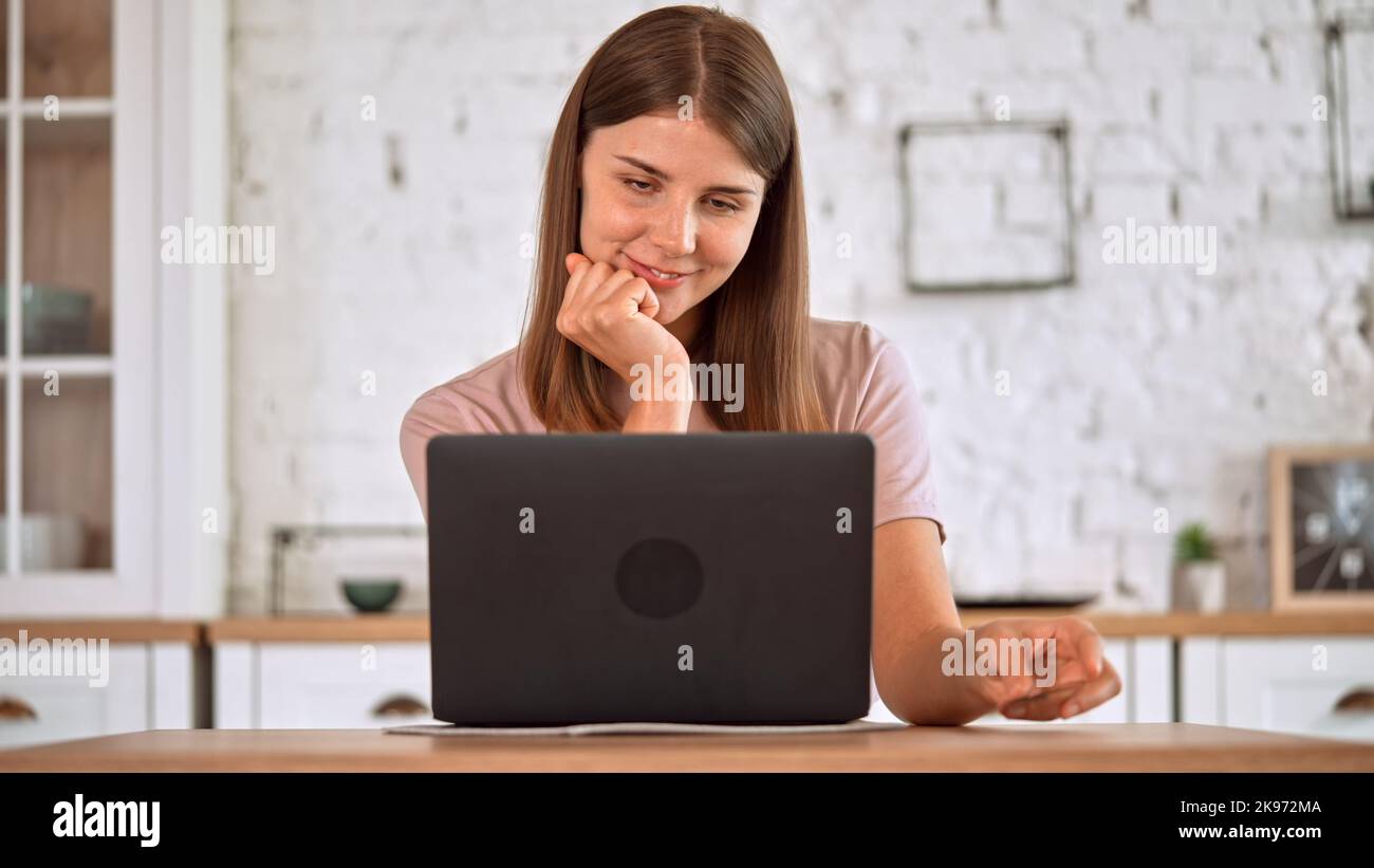A Caucasian business woman working on laptop in the office. Ukraine ...