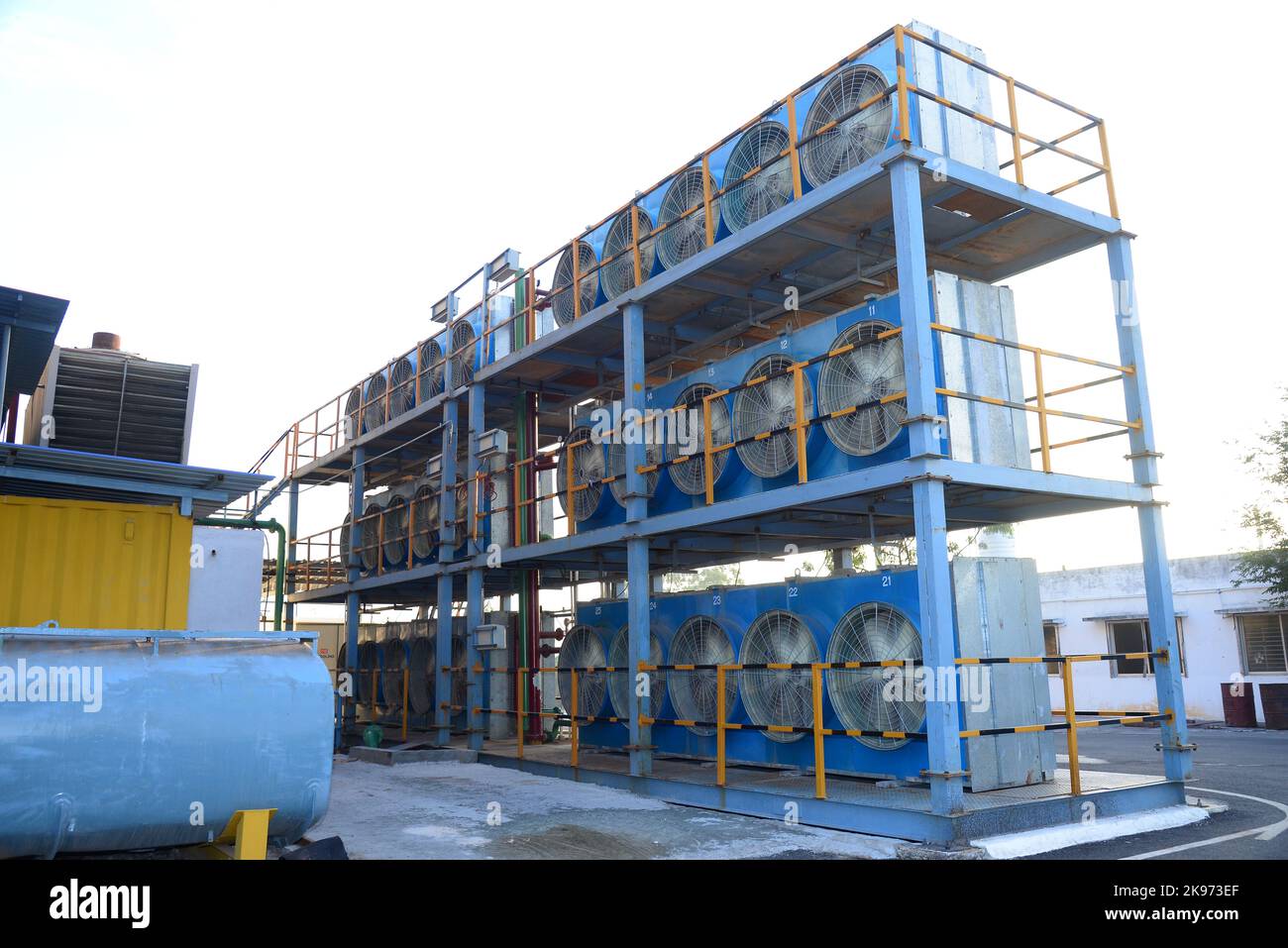 The exterior of a warehouse with huge fans stored atop each other Stock ...
