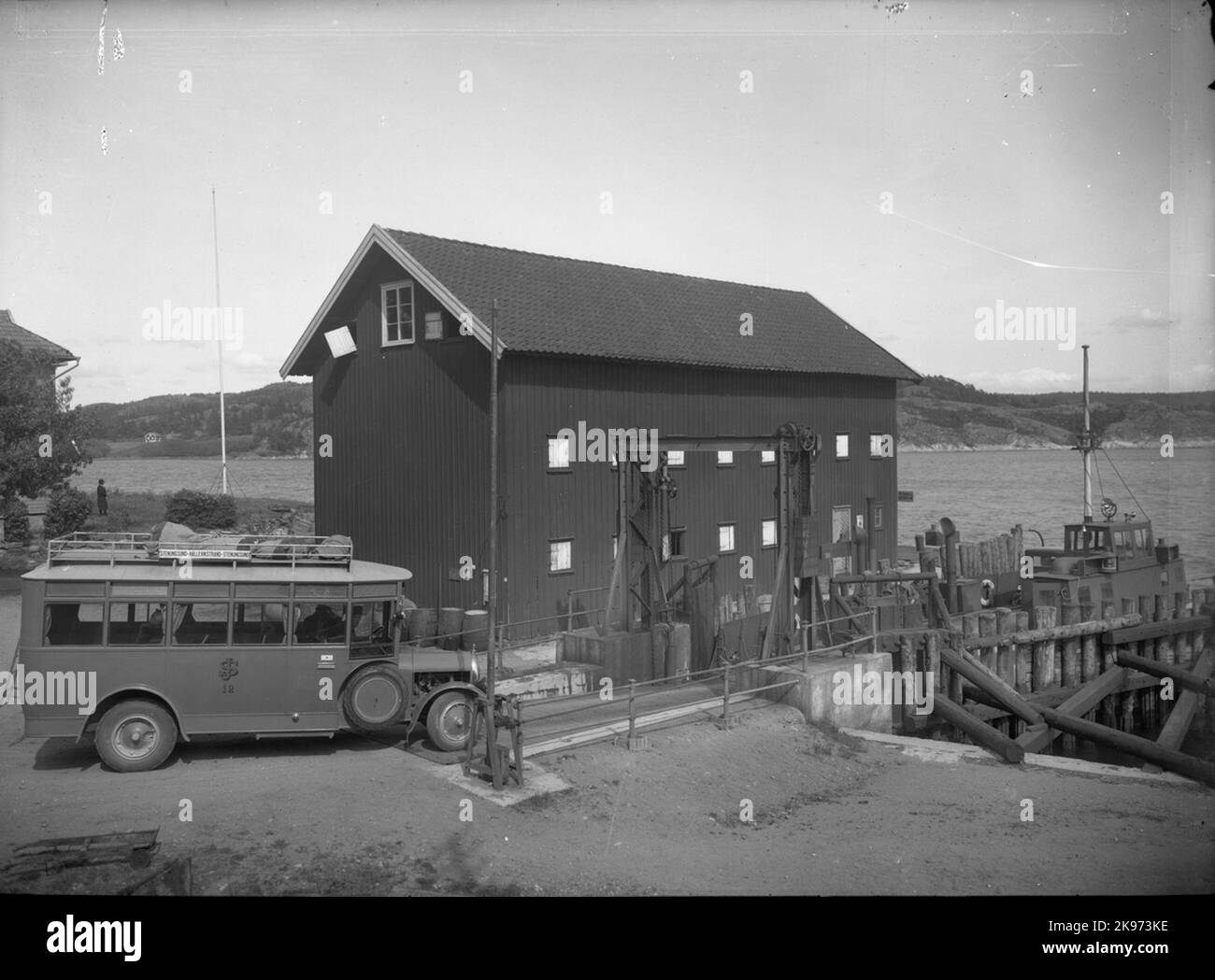 State Railways, SJ Bus 12 which is about to board (or back off) the ...