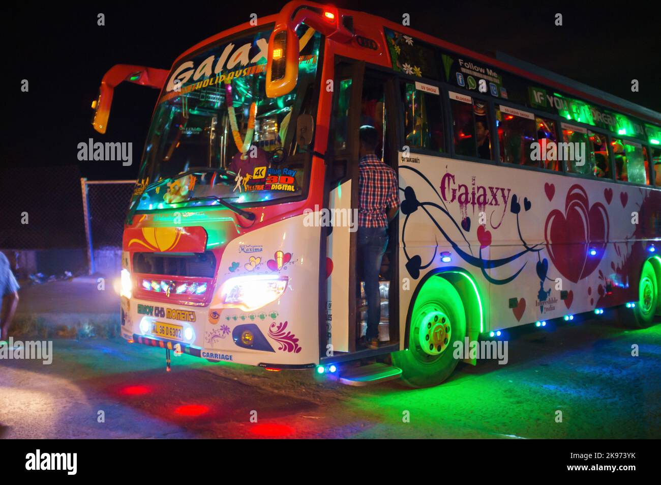 The colorful lights on a party bus in Mysore India at night Stock Photo ...
