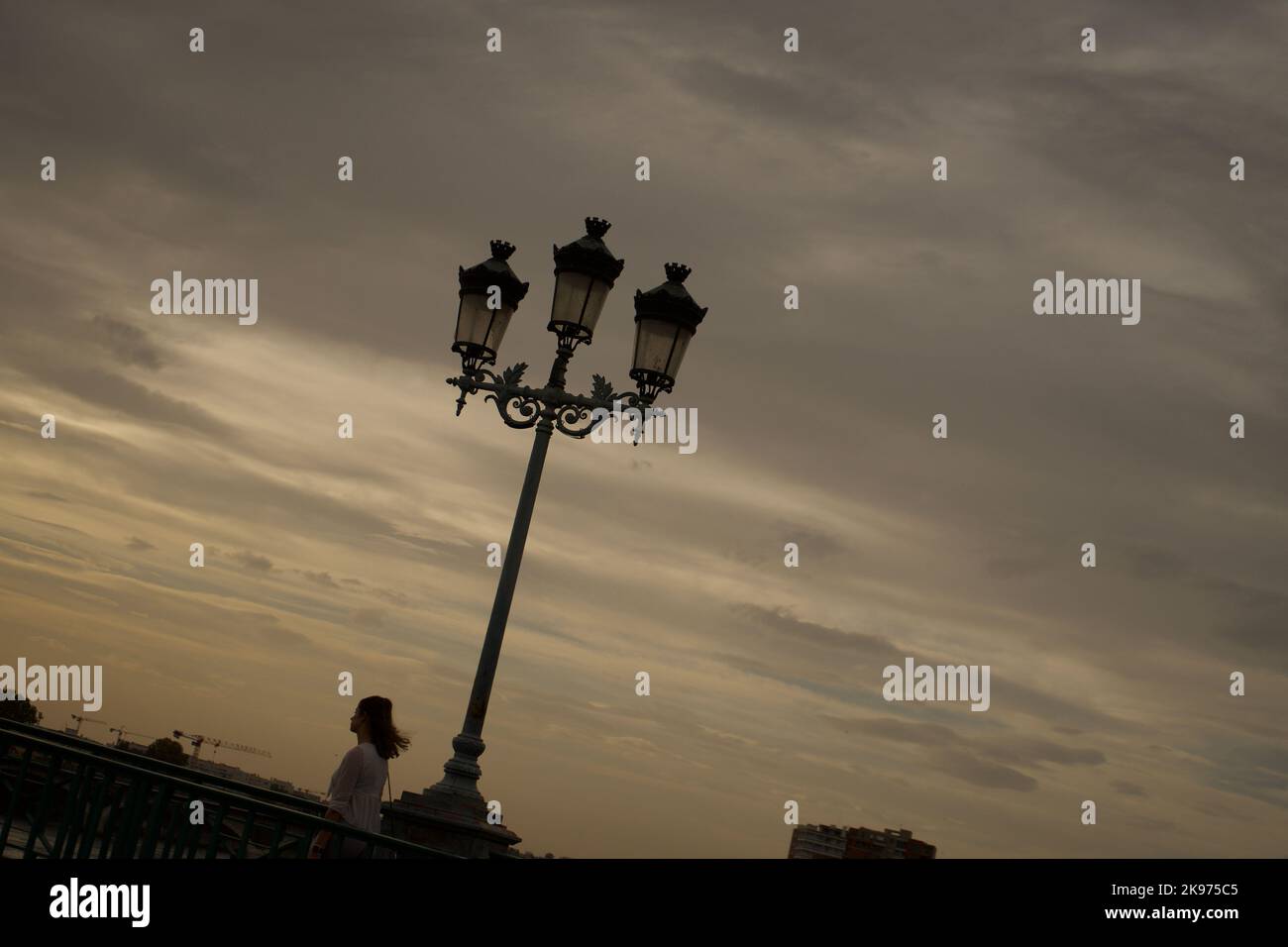 Sunset on the bridge of the river Haute Garonne, Toulouse, south of ...