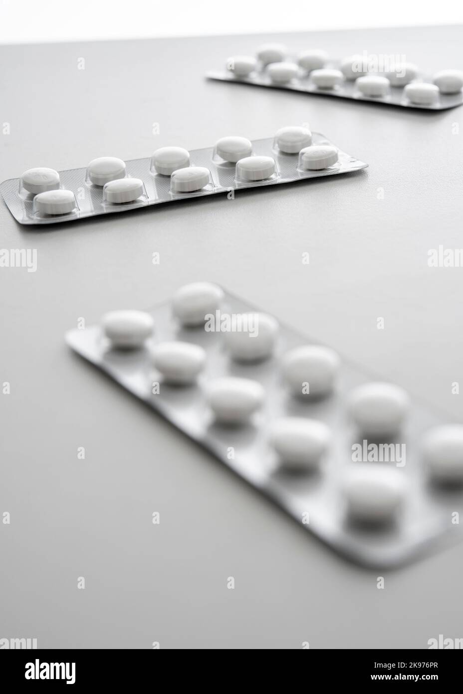 A closeup of packaging of medicinal tablets in gray background Stock ...