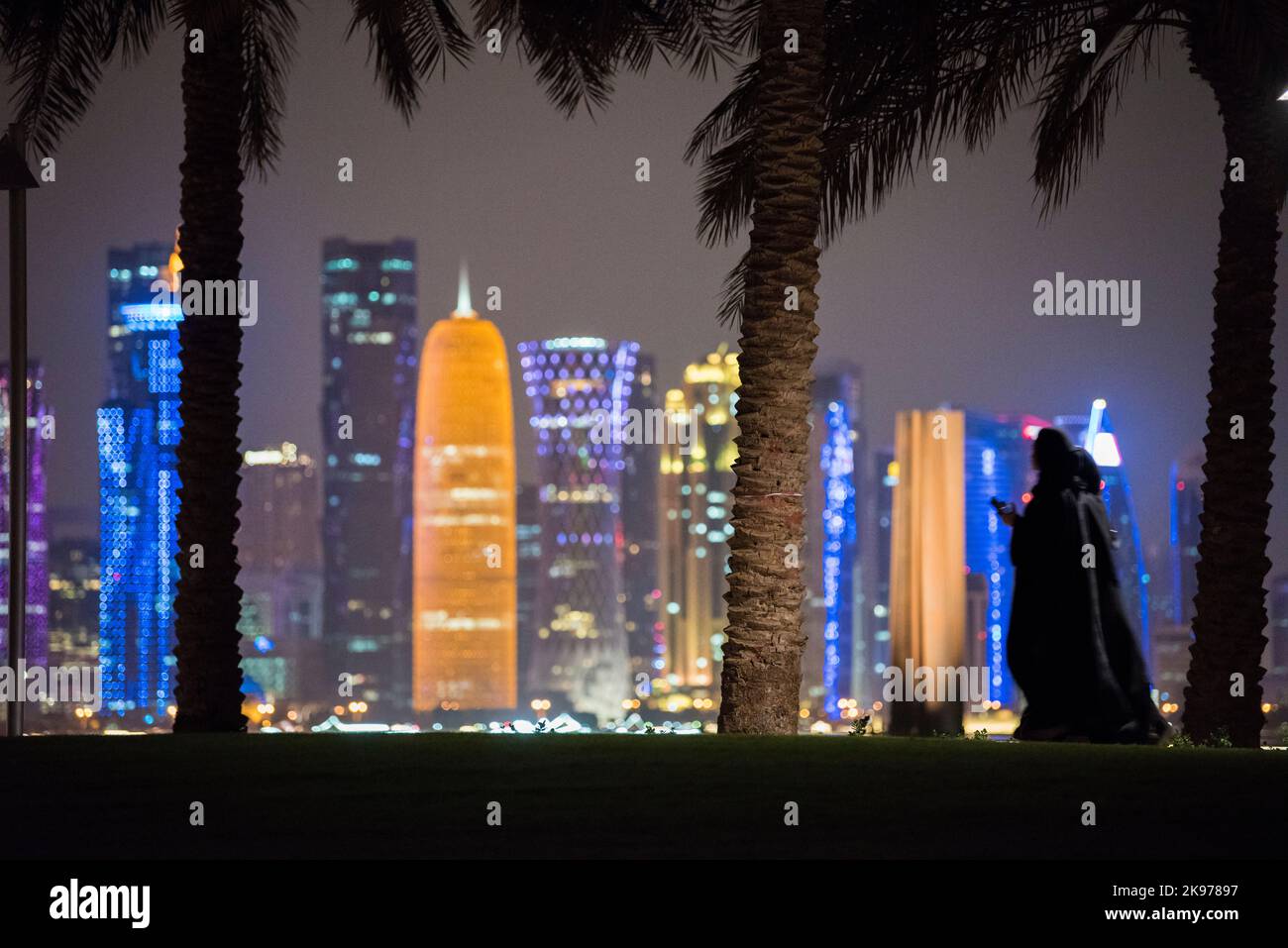 Doha, Qatar- October 23,2022 :Qatari on a night walk in the park of the ...