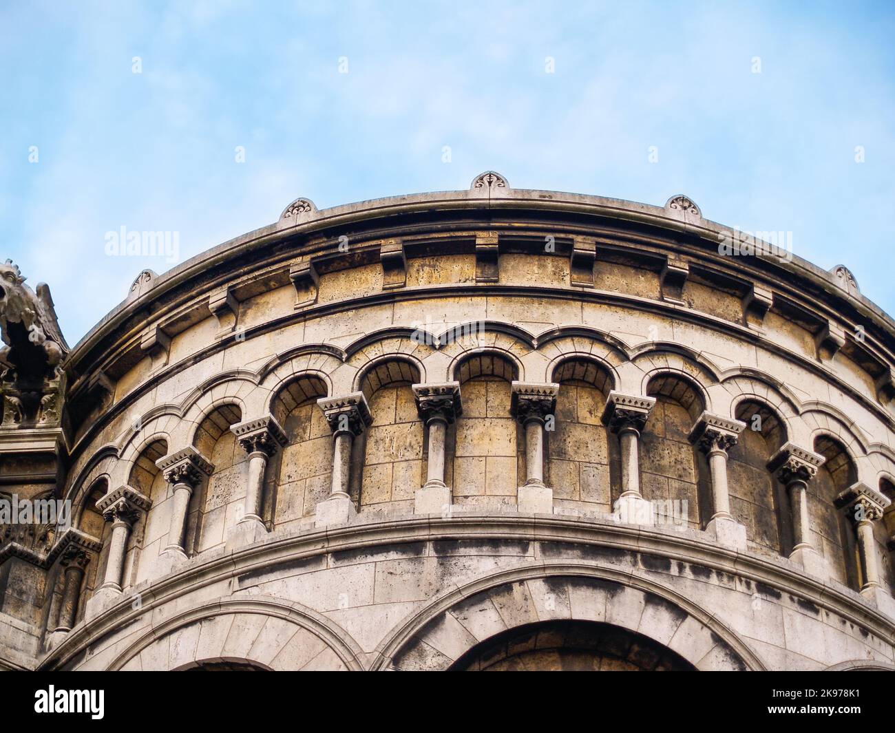 Architectural detail of circular exterior wall of cathedral in Paris ...