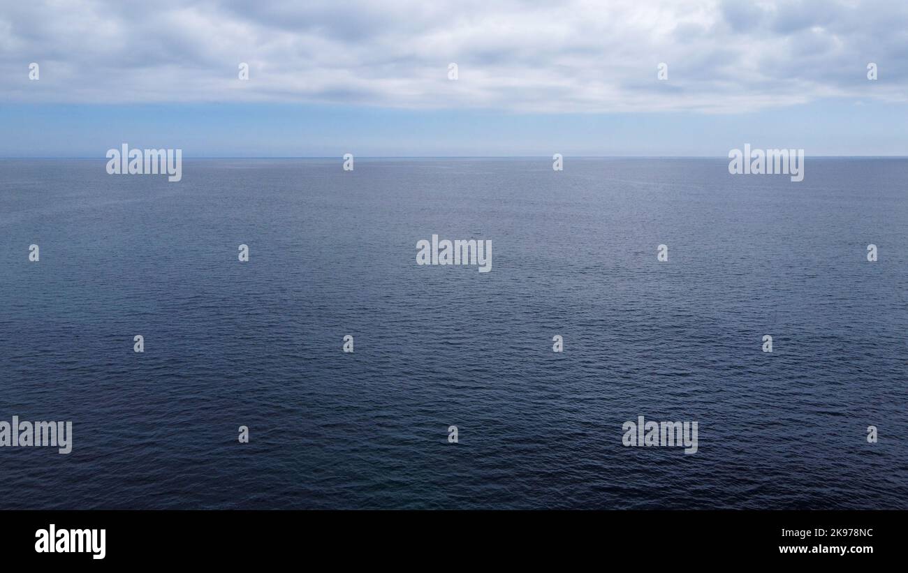 Huge expanses of water and the sky above them. Calm water surface ...