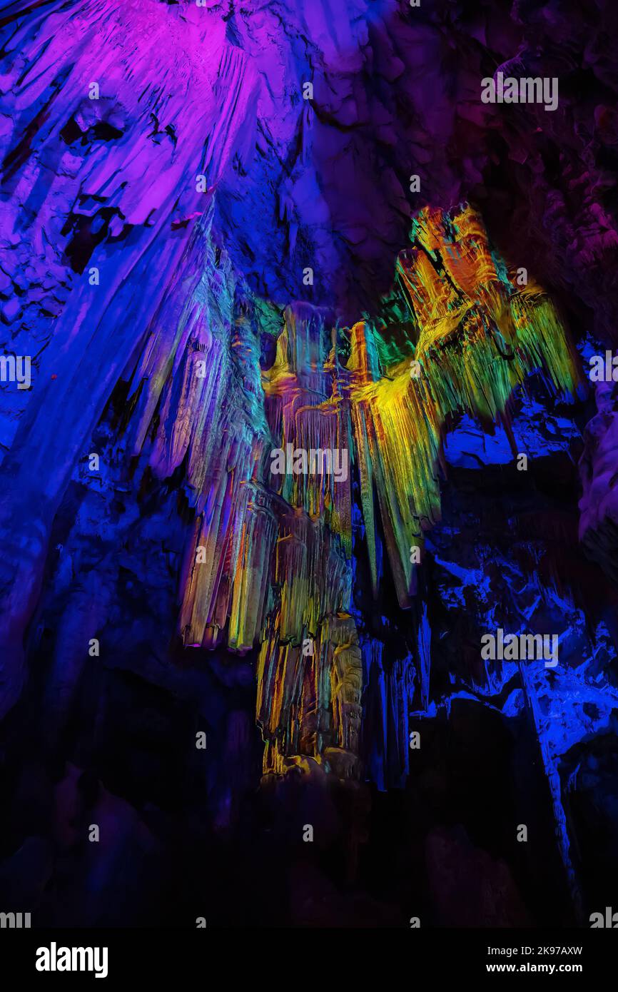 Saint Michael's Cave with colorful lights and Angel. Natural Rock ...