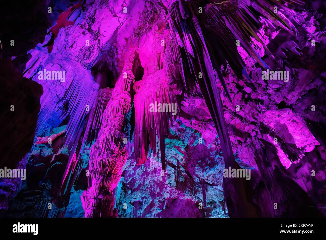 Saint Michael's Cave with colorful lights. Natural Rock Formation ...