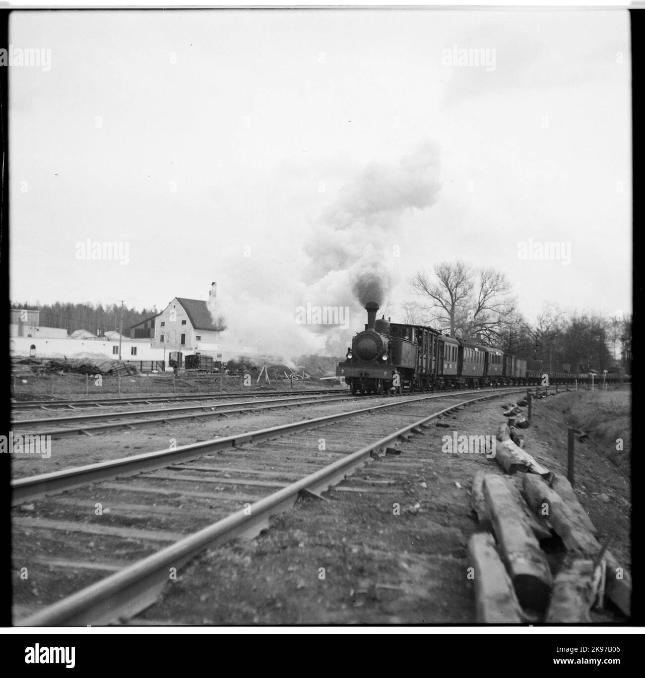 Mixed train drawn by steam locomotive Stock Photo - Alamy