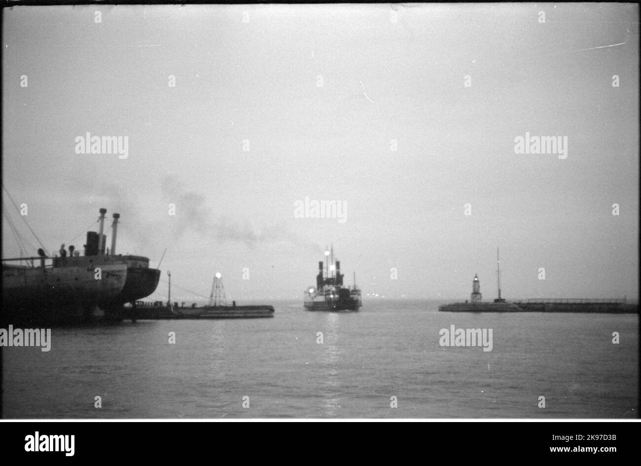 Train ferry on the way at harbor entrance Stock Photo - Alamy