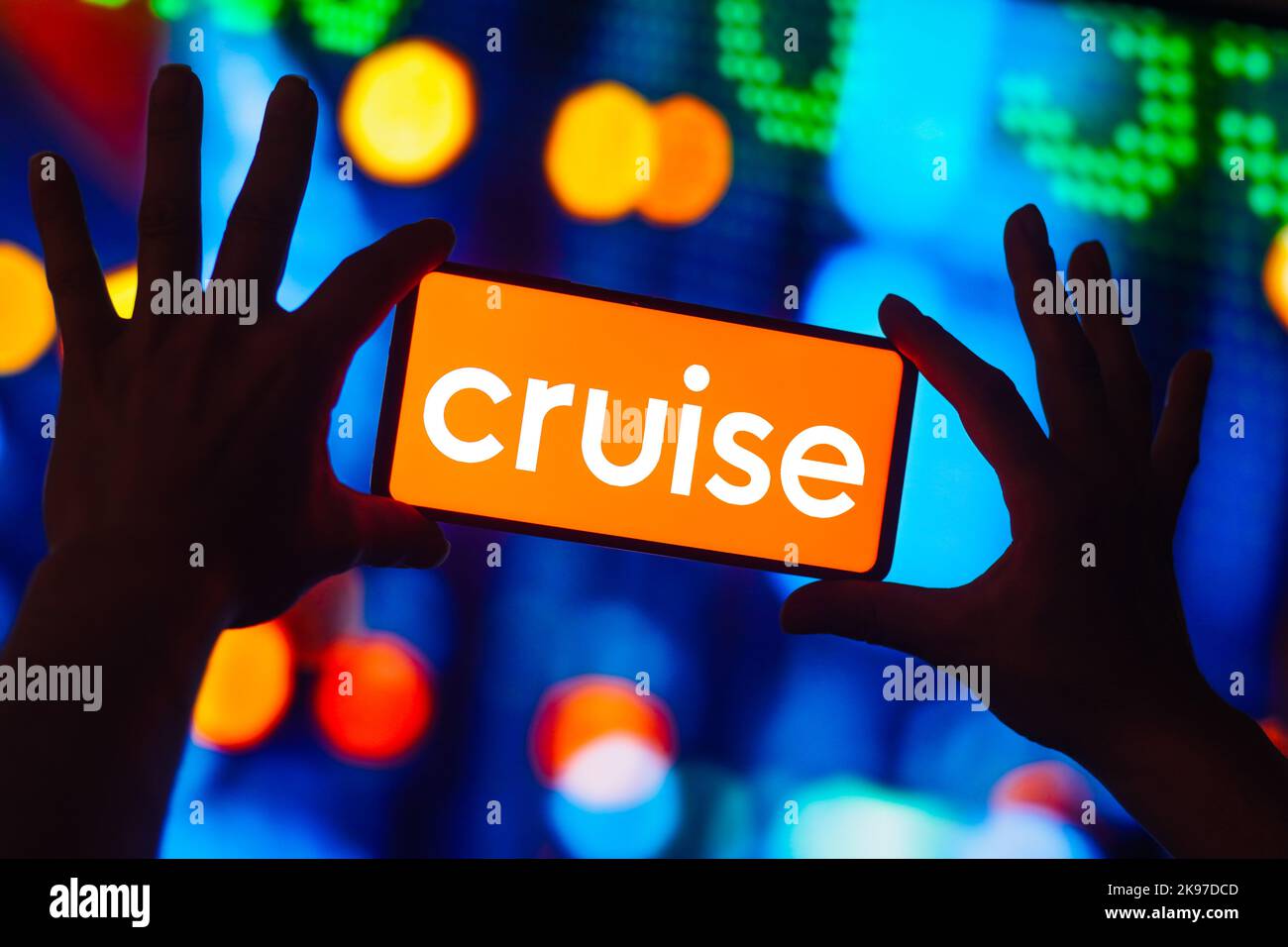 In this photo illustration, the Cruise LLC logo is displayed on a ...