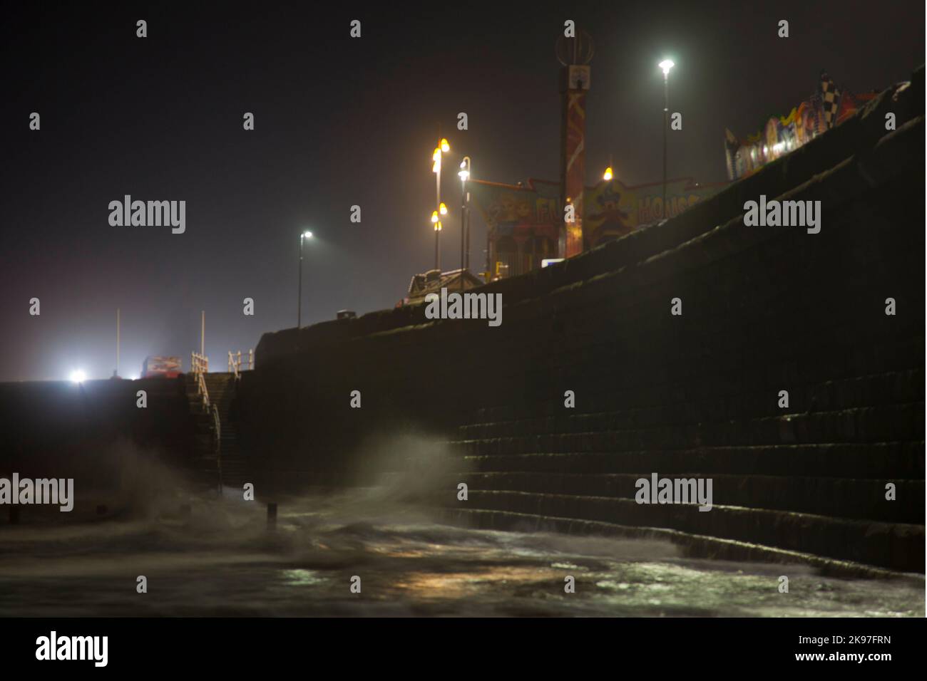 North Beach Harbour walls with incoming waves crashing into the sea ...
