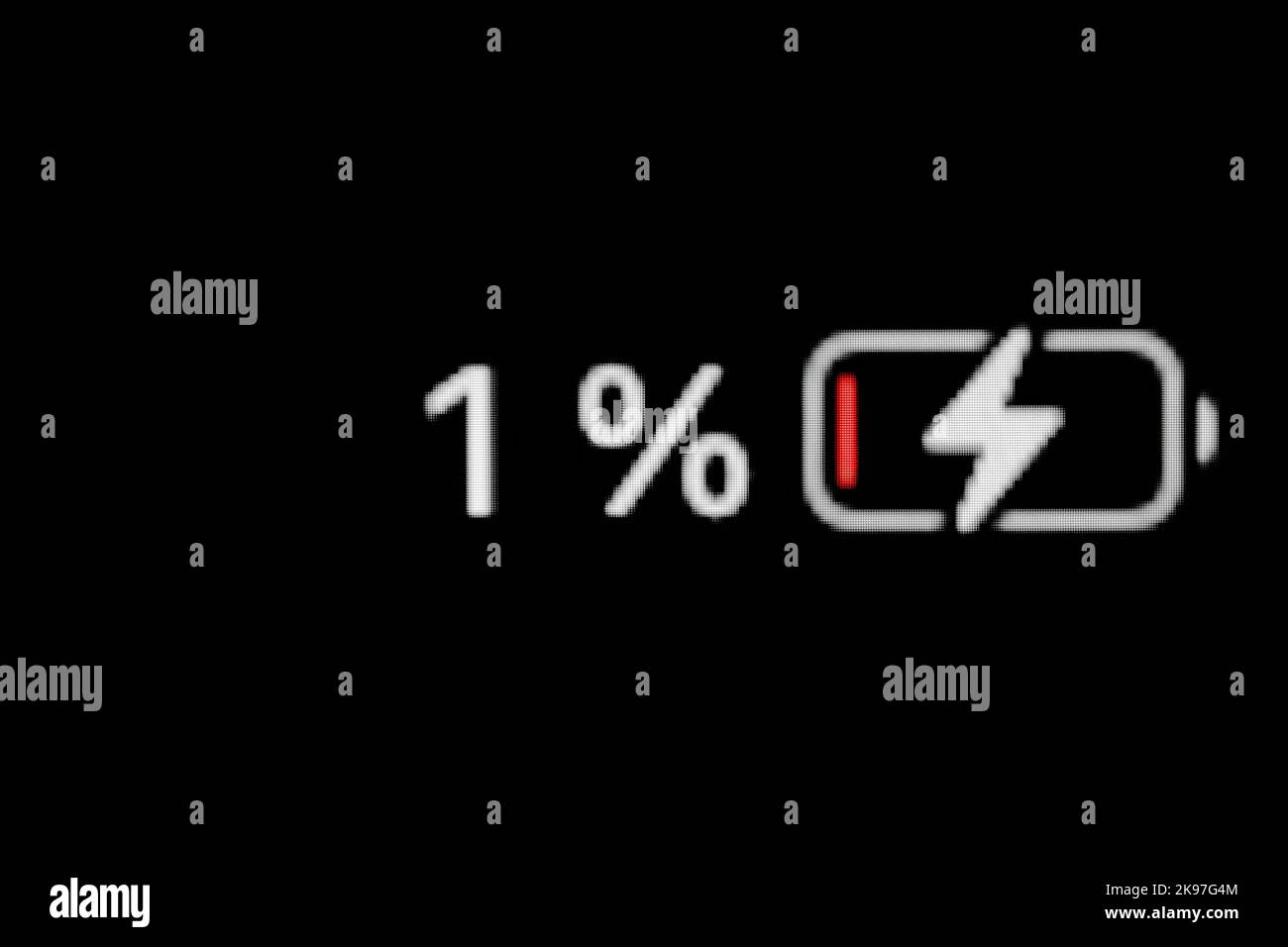 Smartphone charged battery level indicator - one, 1 percent: close up ...