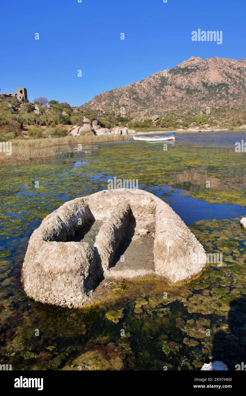 Landscape around Lake Bafa in Turkey, with ancient tombs near the water ...