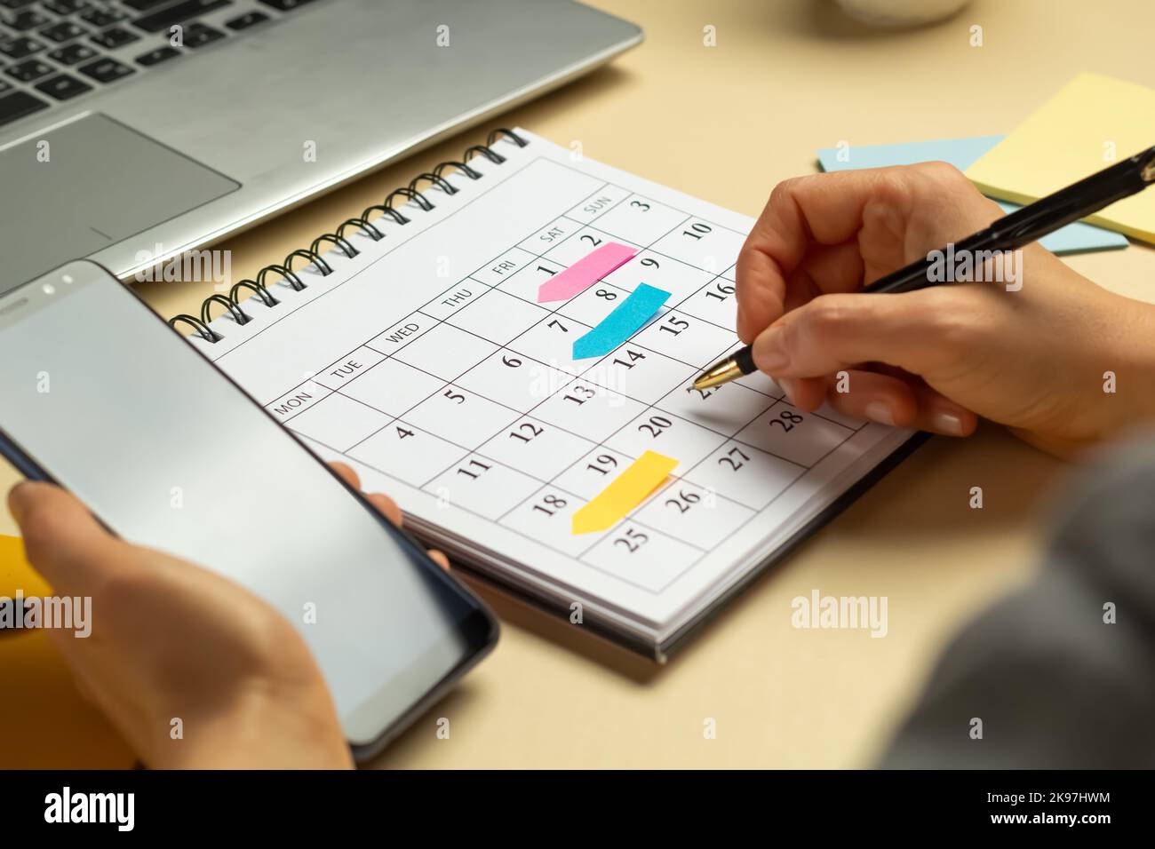 Planning and notes marked in the calendar diary Stock Photo - Alamy