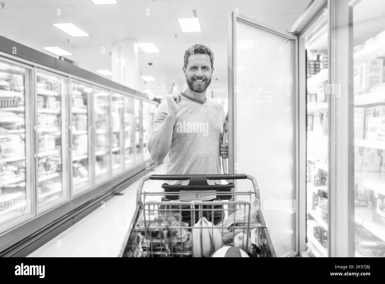 inspired with idea. customer consumer with purchases. guy at grocery ...