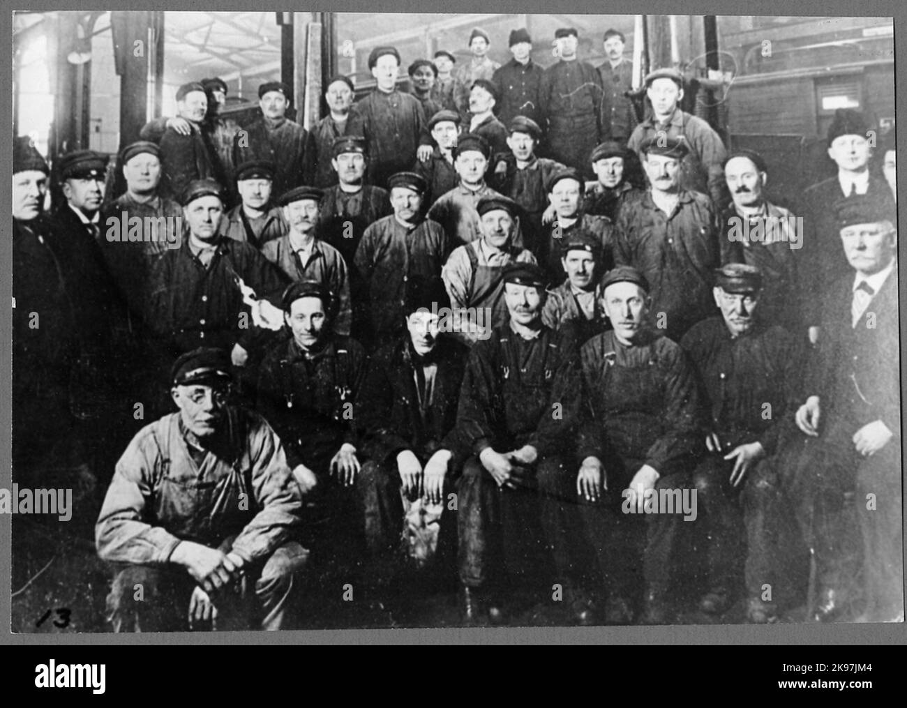 Wagon workshop staff photographed inside the workshop. Group photo ...