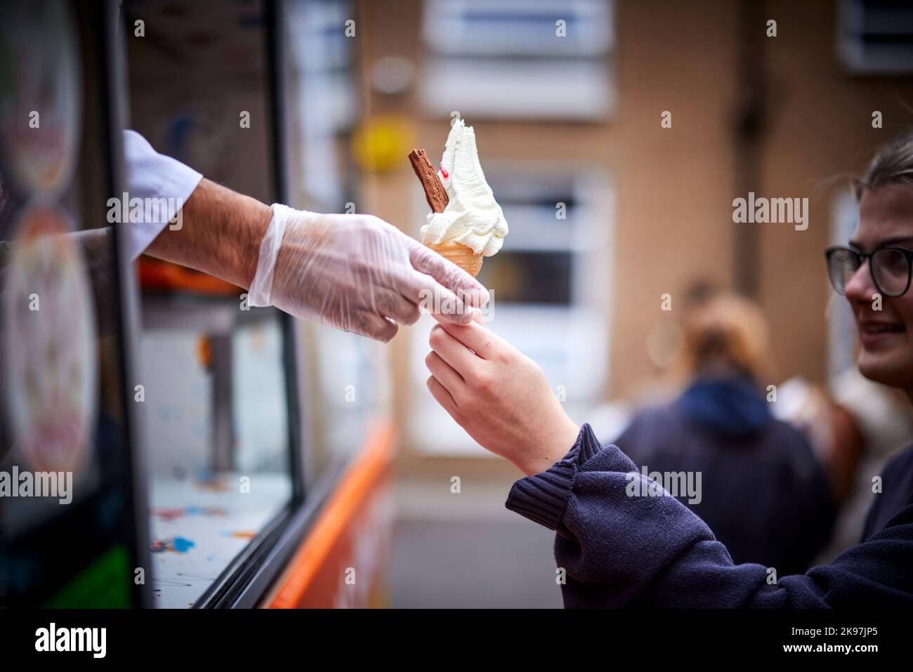 Whipped ice cream cone from a van Stock Photo - Alamy