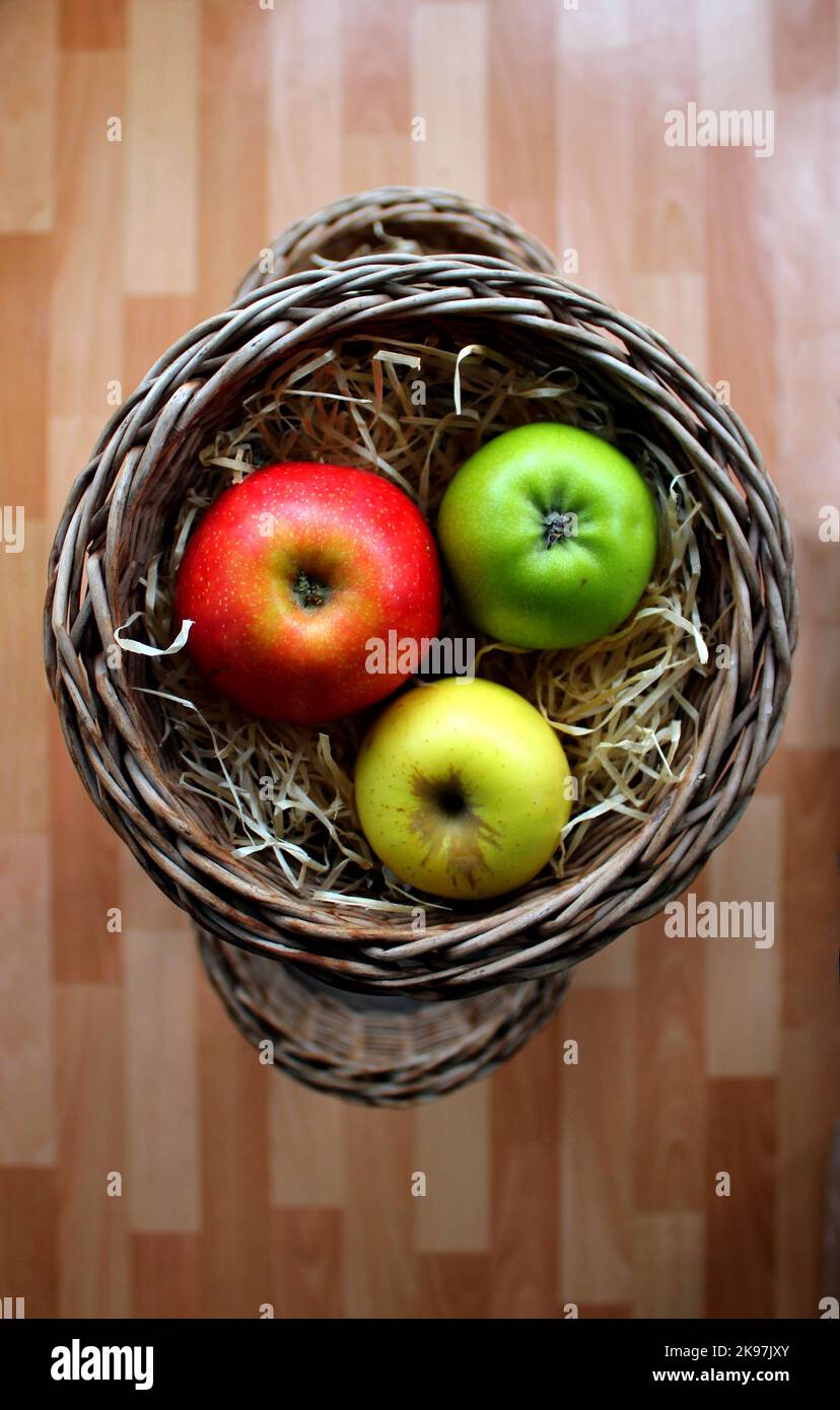 Whole Variety Colored Ripe Apples In A Wood Shavings Inside A Wicker ...