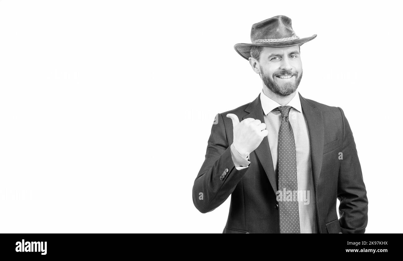 Happy businessman man in cowboy hat and suit smile pointing finger ...