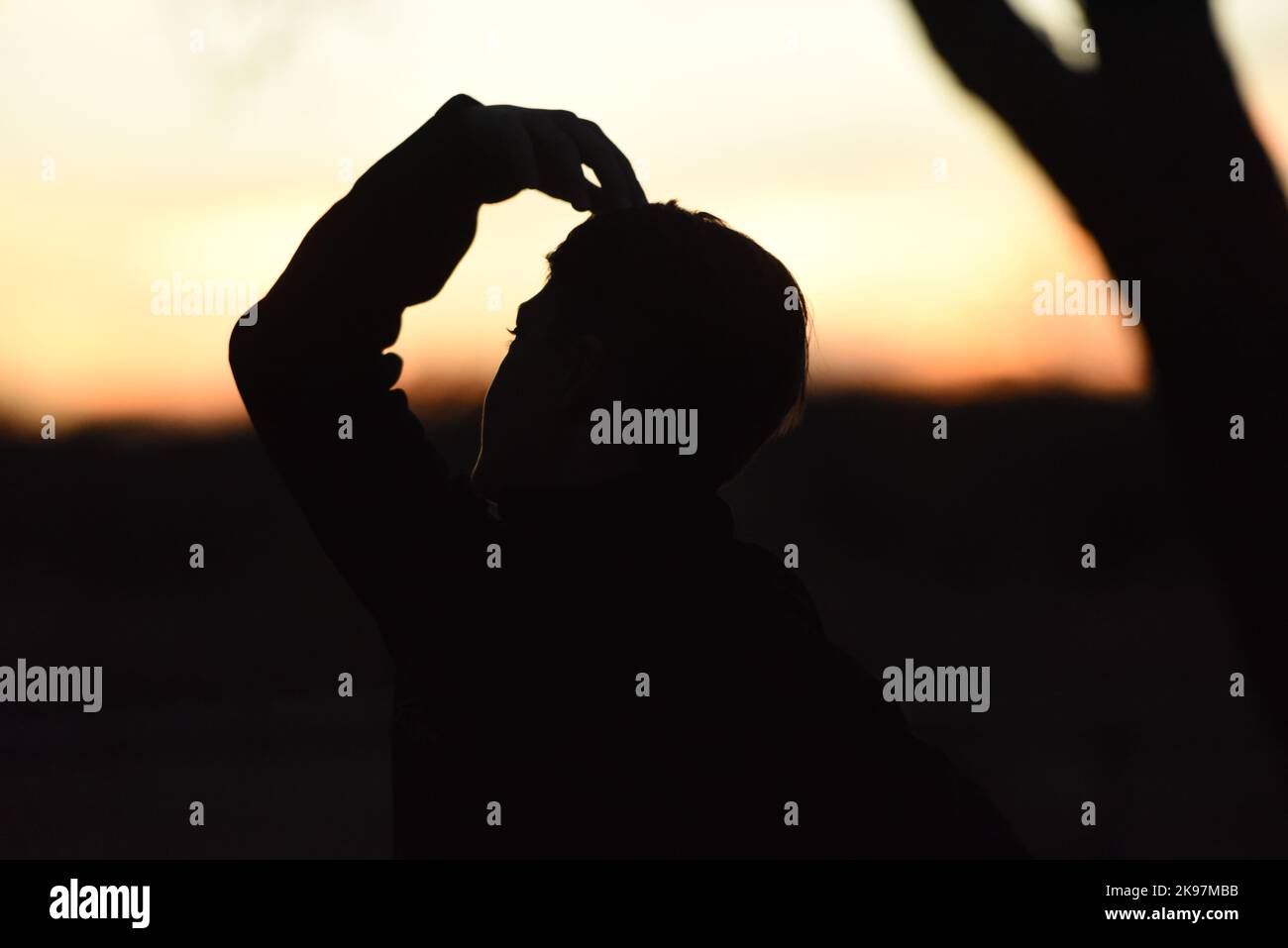 Silhouette of person behind hi-res stock photography and images - Alamy