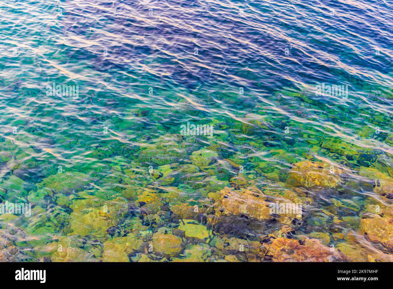 Beautiful Kavouri beach and bay with turquoise blue water and nature ...