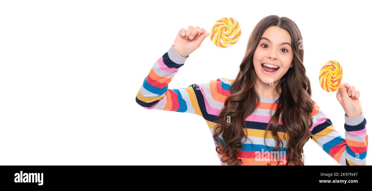 happy kid in colorful sweater with lollipop candy on stick isolated on ...