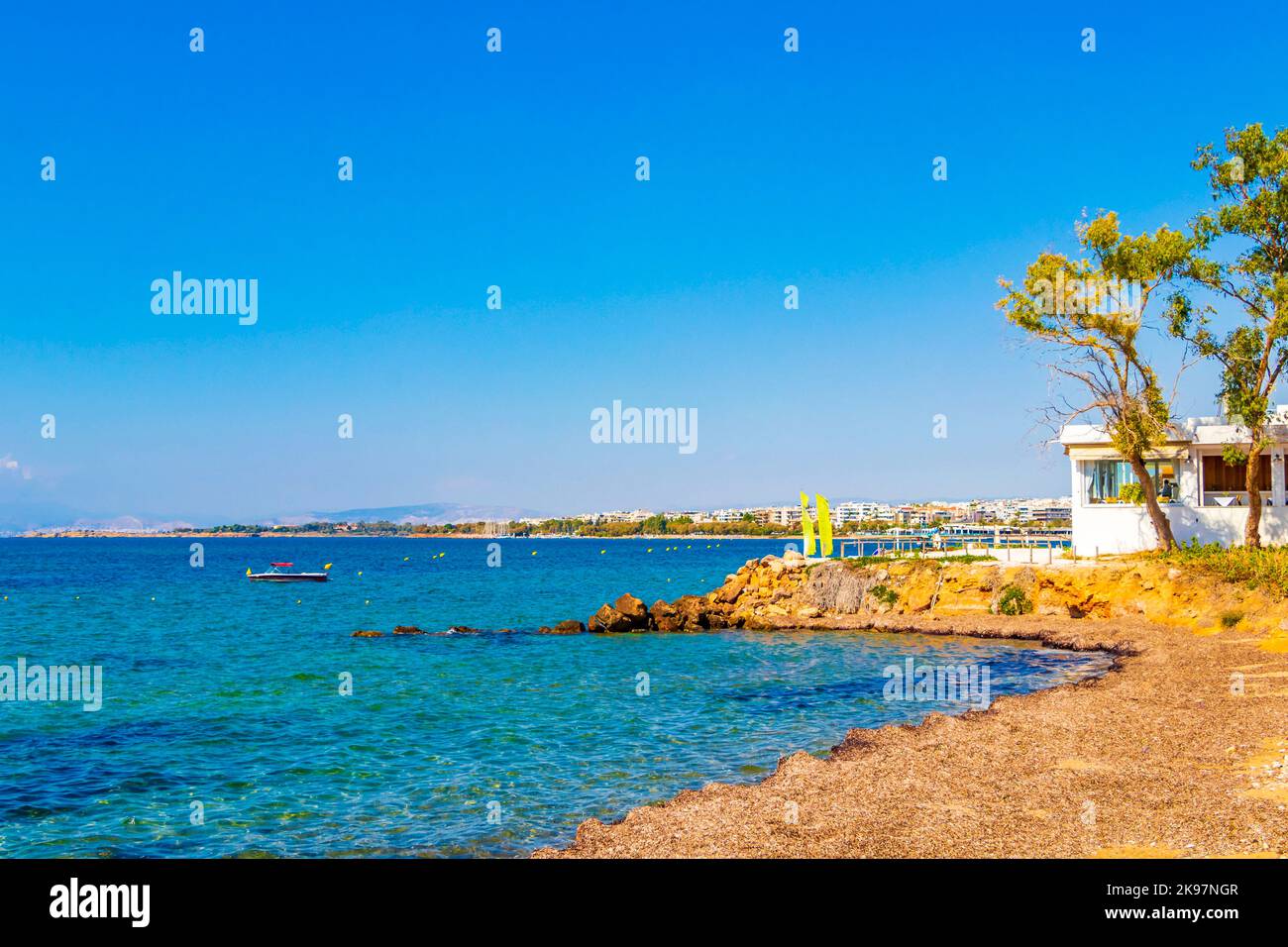 Beautiful Kavouri beach and bay with turquoise blue water and nature in ...