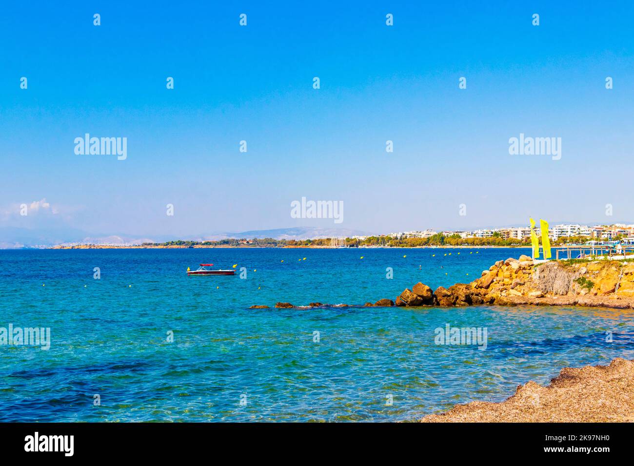 Beautiful Kavouri beach and bay with turquoise blue water and nature in ...