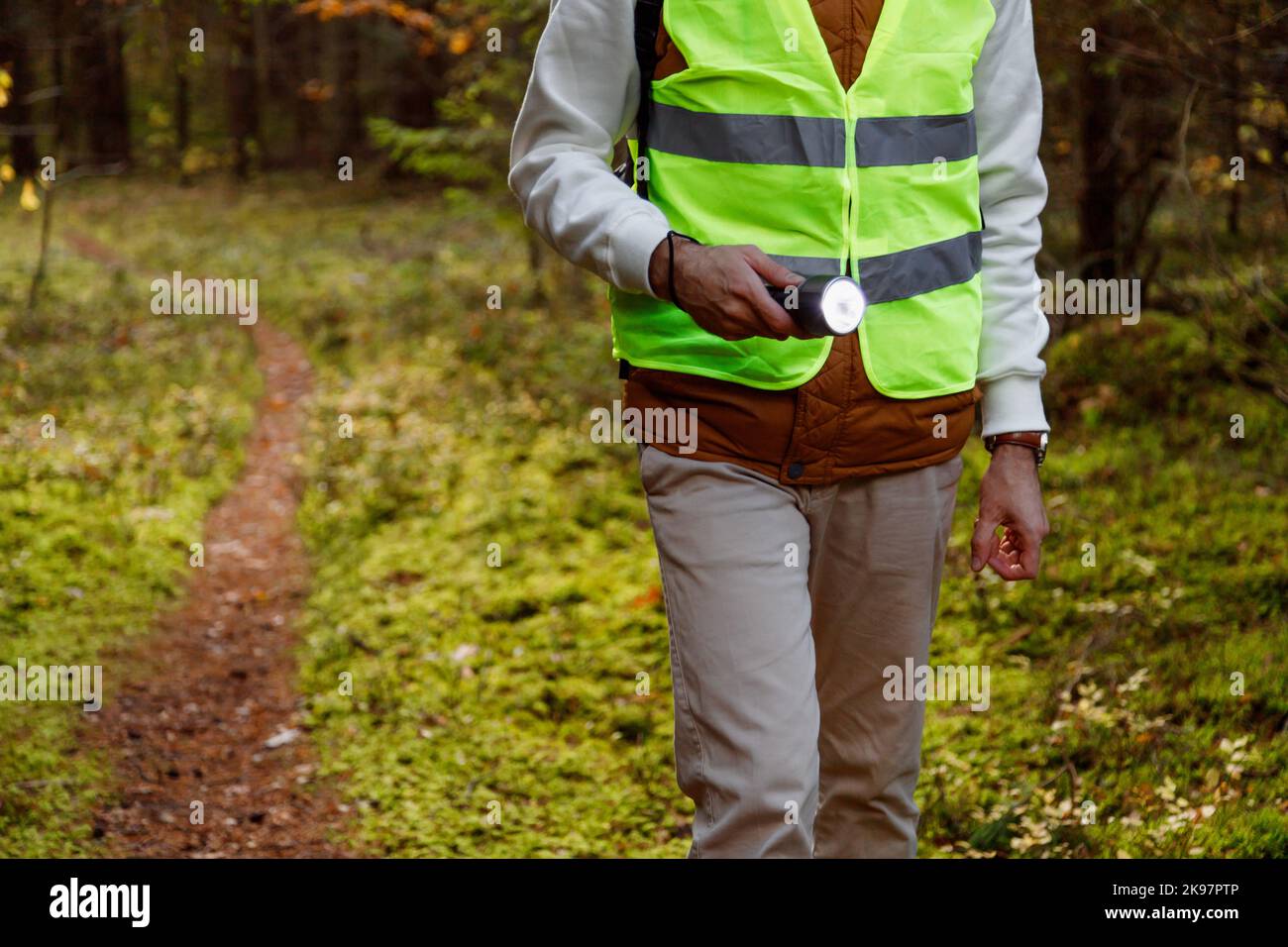 Male Volunteer of the Search and Rescue Team Dressed in a Signal Vest ...