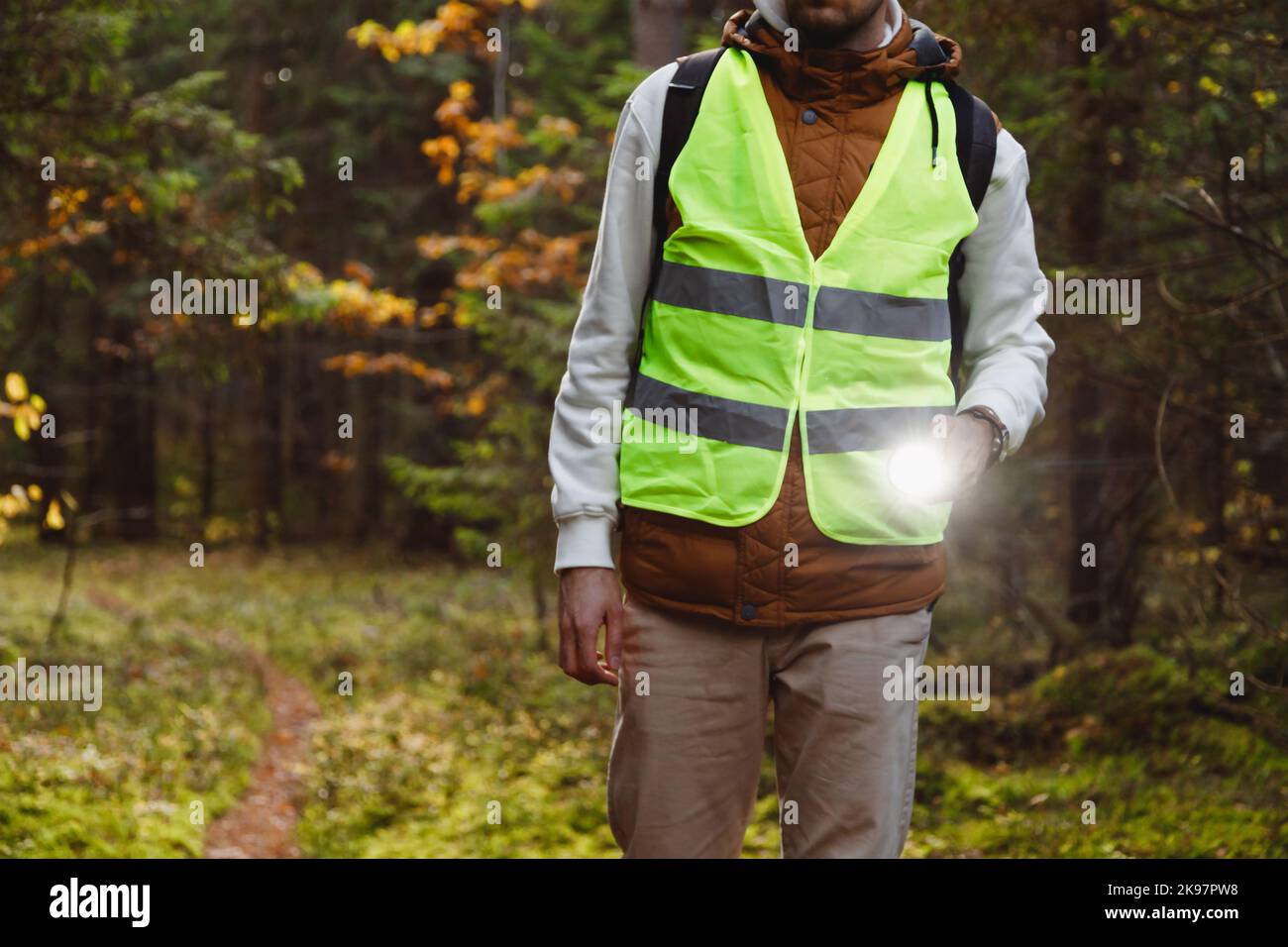 Male Volunteer of the Search and Rescue Team Dressed in a Signal Vest ...