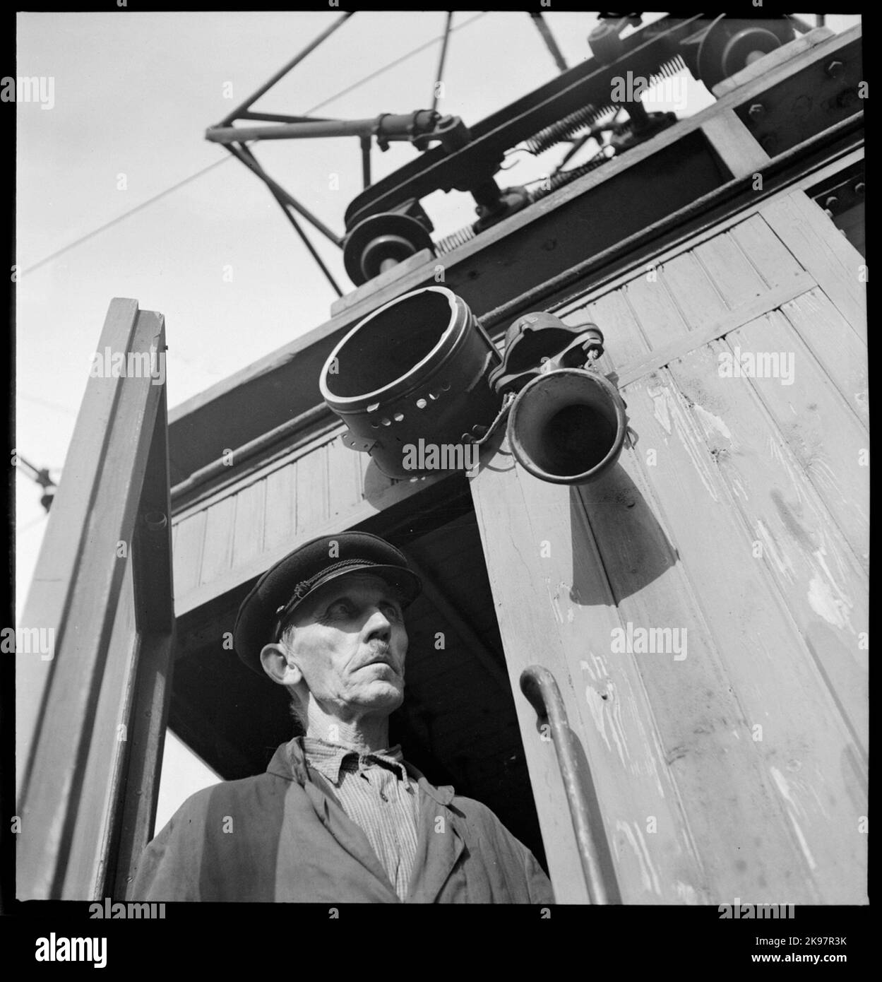 Locomotive driver on an electric locomotor for industrial tracks Stock ...