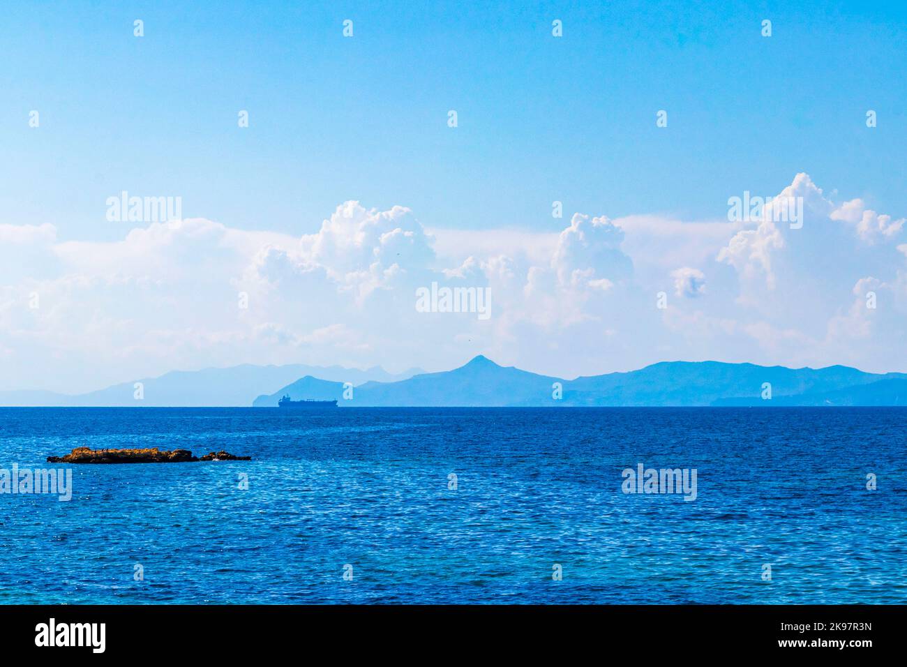 Beautiful Kavouri beach and bay with turquoise blue water and nature in ...