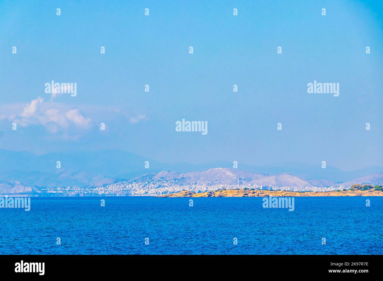 Beautiful Kavouri beach and bay with turquoise blue water and nature in ...