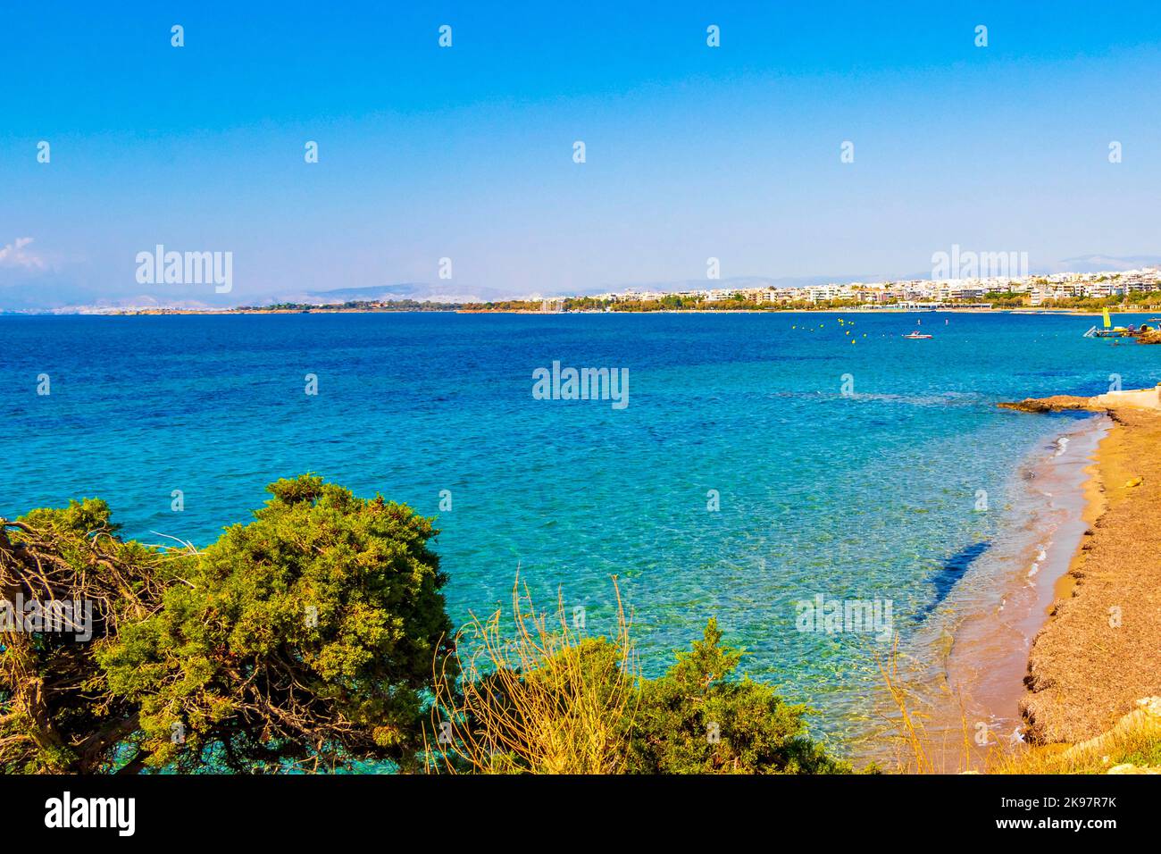 Beautiful Kavouri beach and bay with turquoise blue water and nature in ...