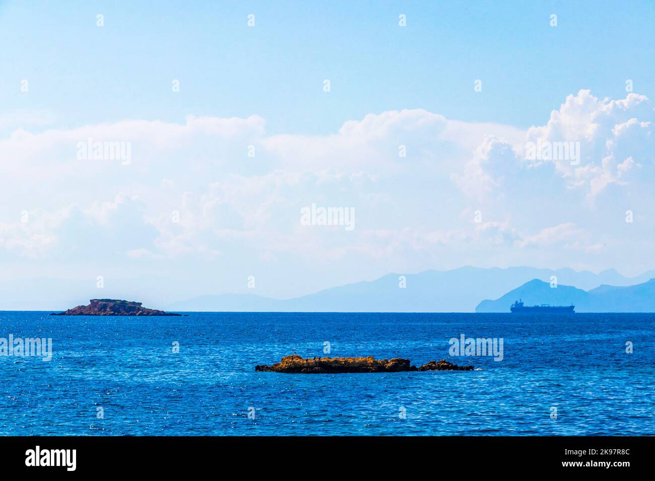 Beautiful Kavouri beach and bay with turquoise blue water and nature in ...