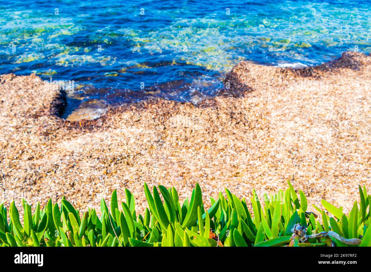 Beautiful Kavouri beach and bay with turquoise blue water and nature in ...
