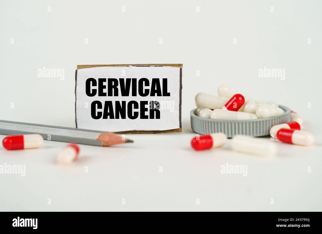 Medical concept. On a white background, medical capsules, a pencil and ...