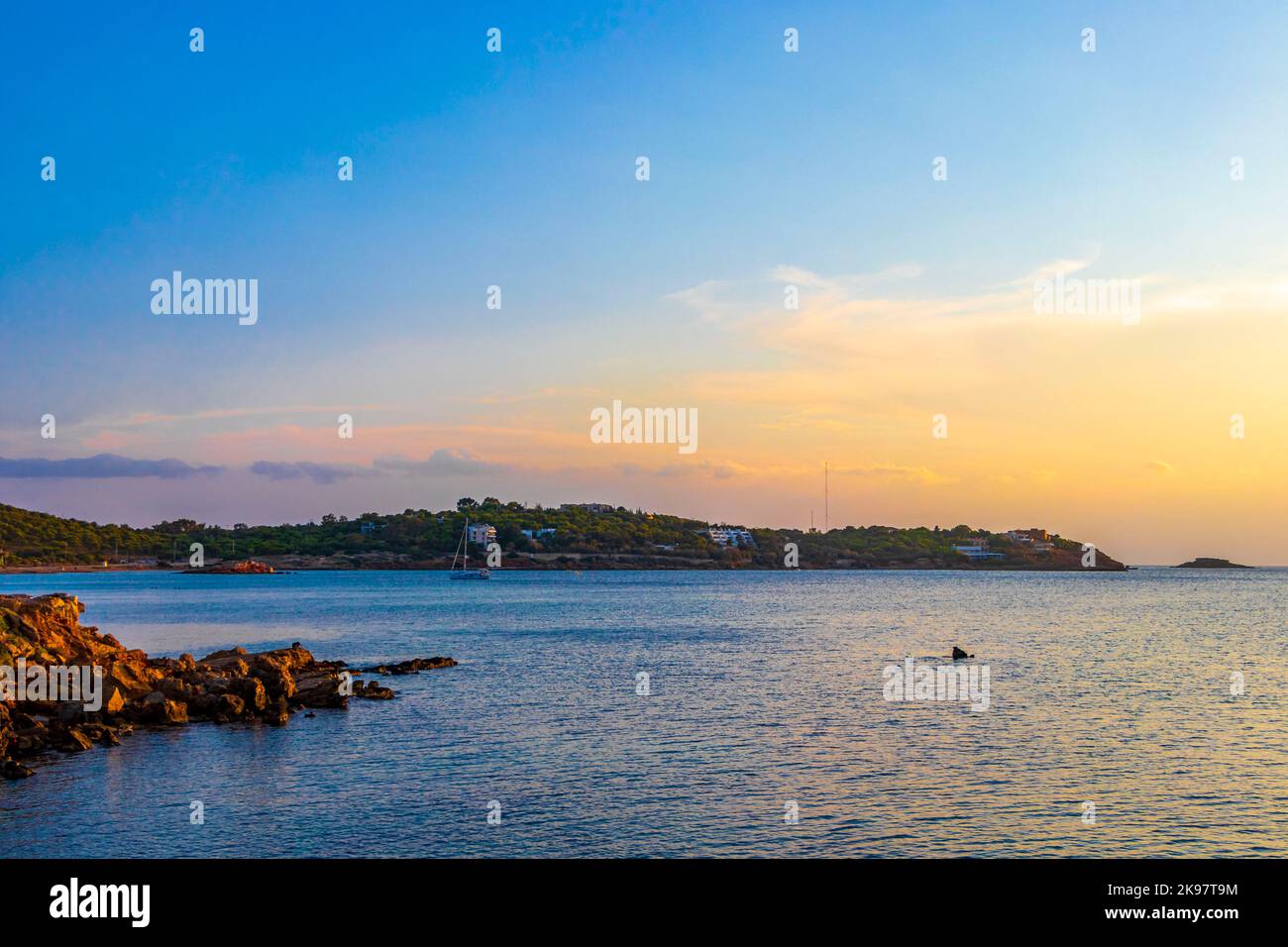 Beautiful Kavouri beach and bay with turquoise blue water and nature in ...