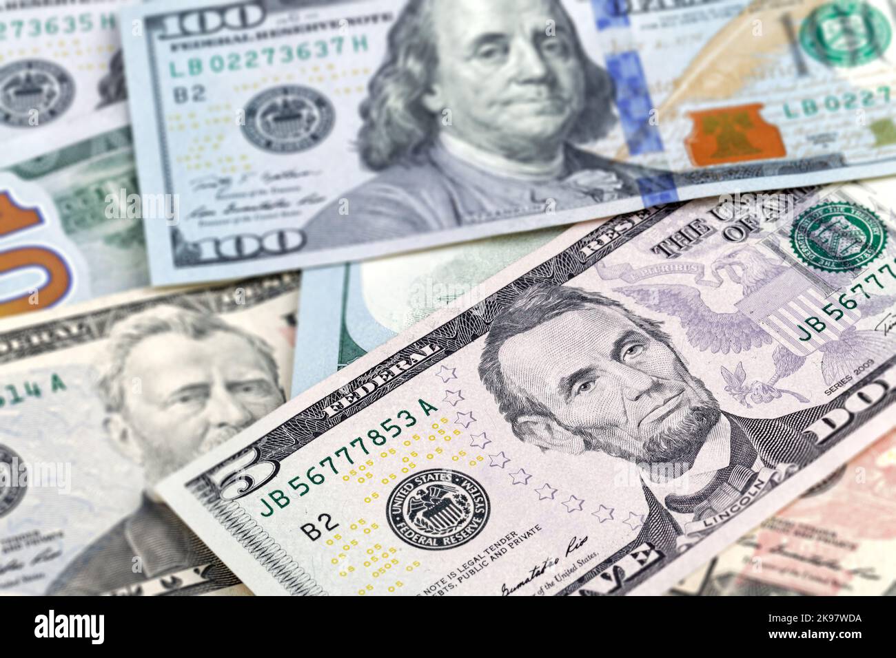 Many american dollar banknotes. Symbolic photo for debt and wealth ...