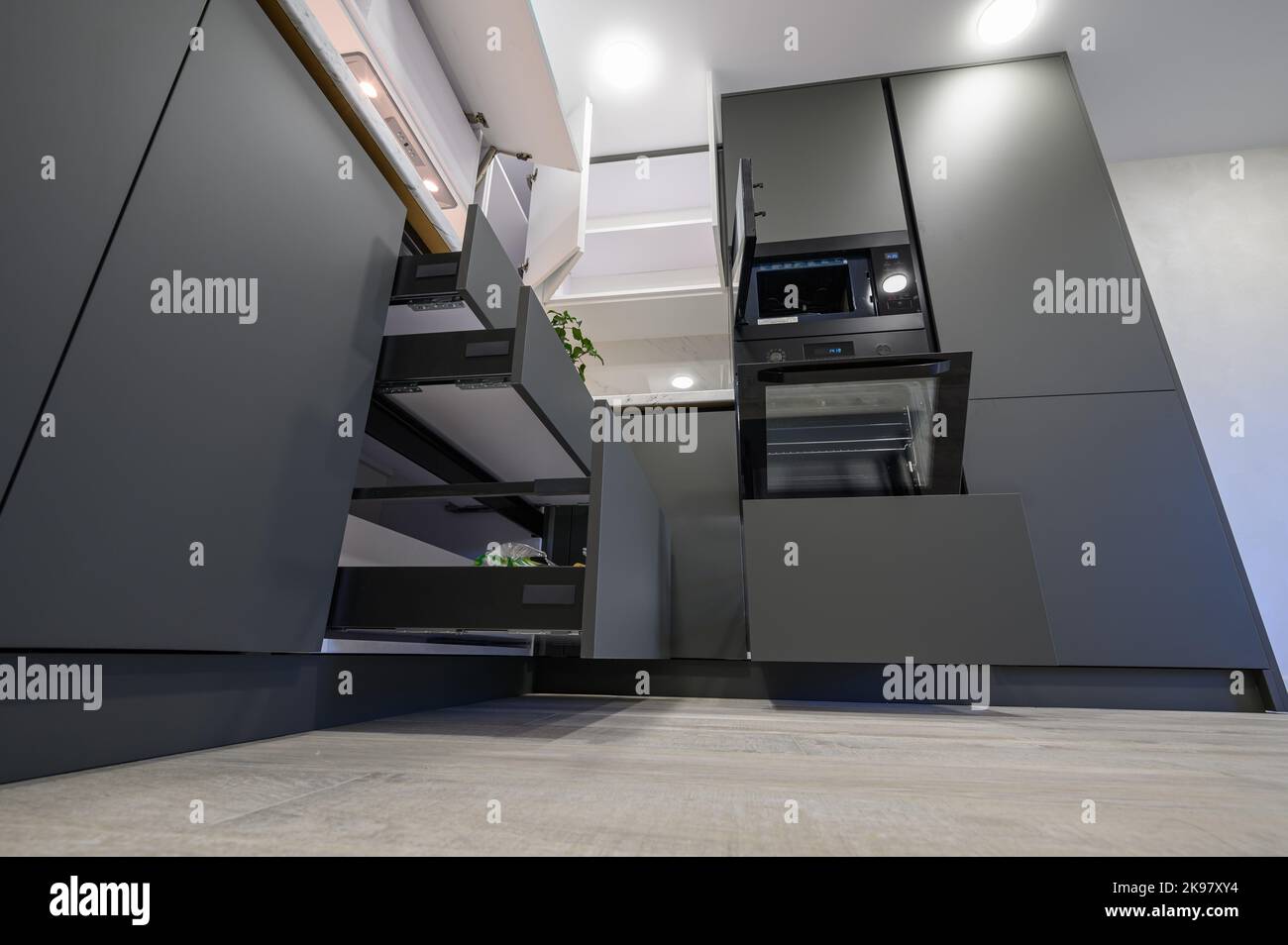 Modern simple trendy dark grey and white kitchen Stock Photo - Alamy