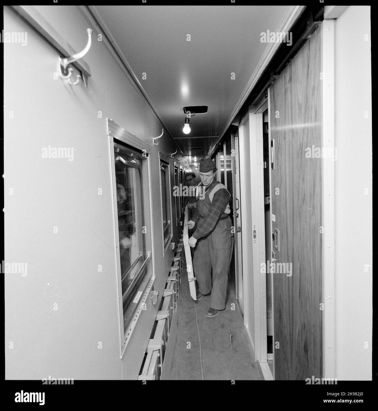 Mounting work in sleeping compartment Stock Photo - Alamy