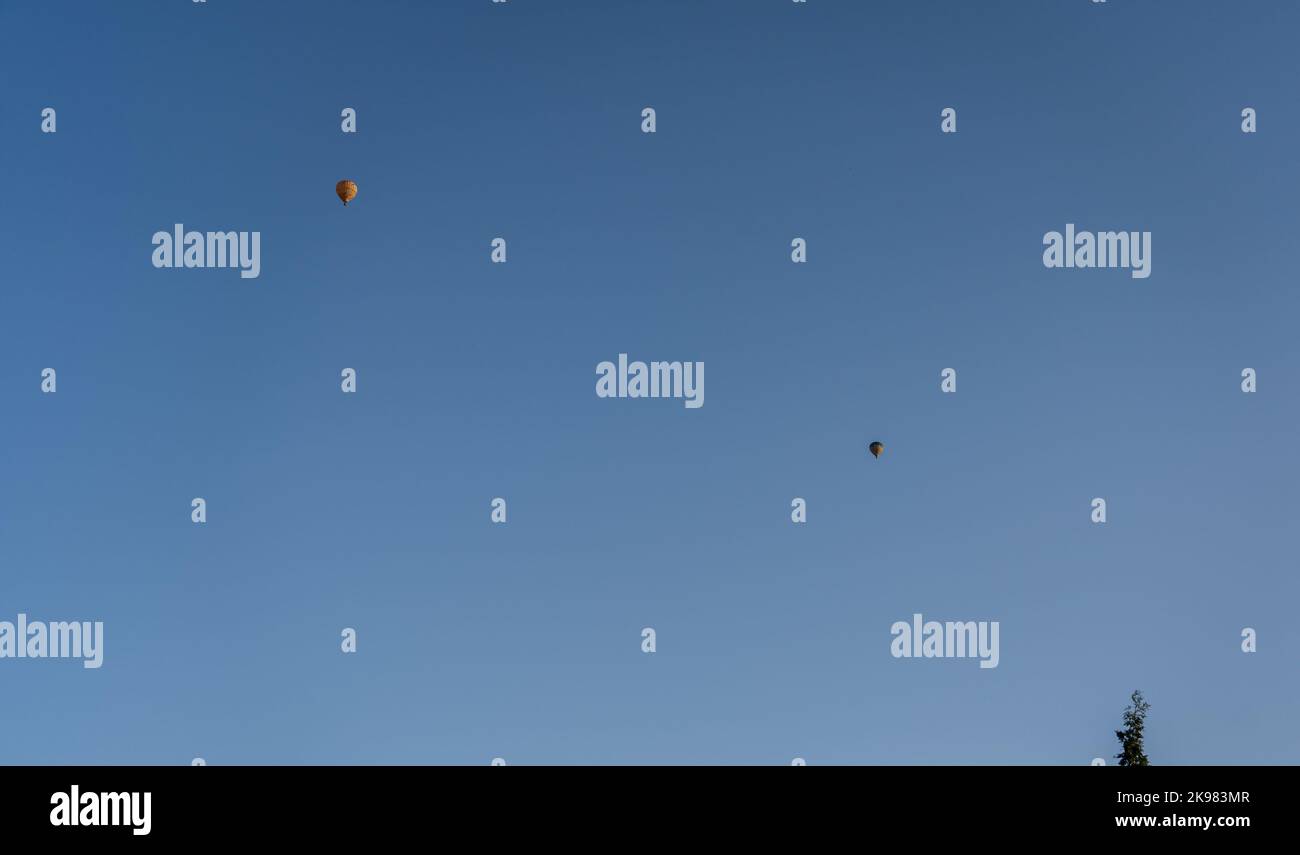 2 high hot air ballons in a clear blue sky Stock Photo - Alamy