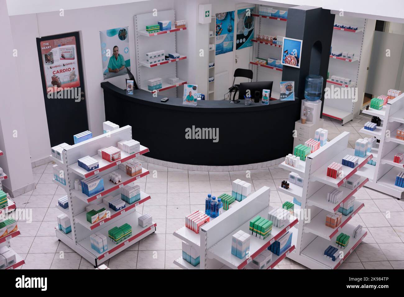 Empty pharmacy with nobody in it having shevles with pharmaceutical ...